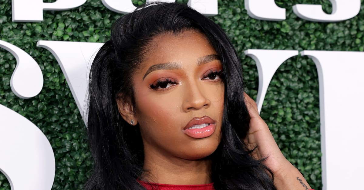 Angel Reese’s Bright Red Lace Outfit Could Not Have Been More Fit for ...