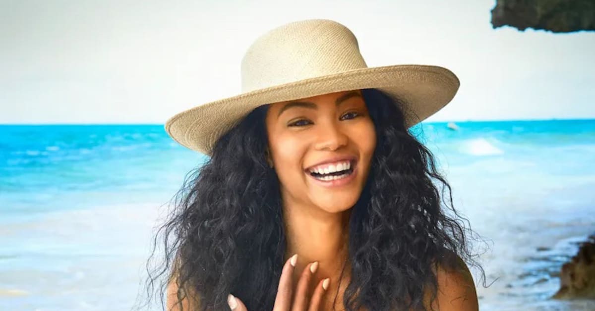 The Story Behind the Famous SI Swim Photo of Chanel Iman Charming a ...